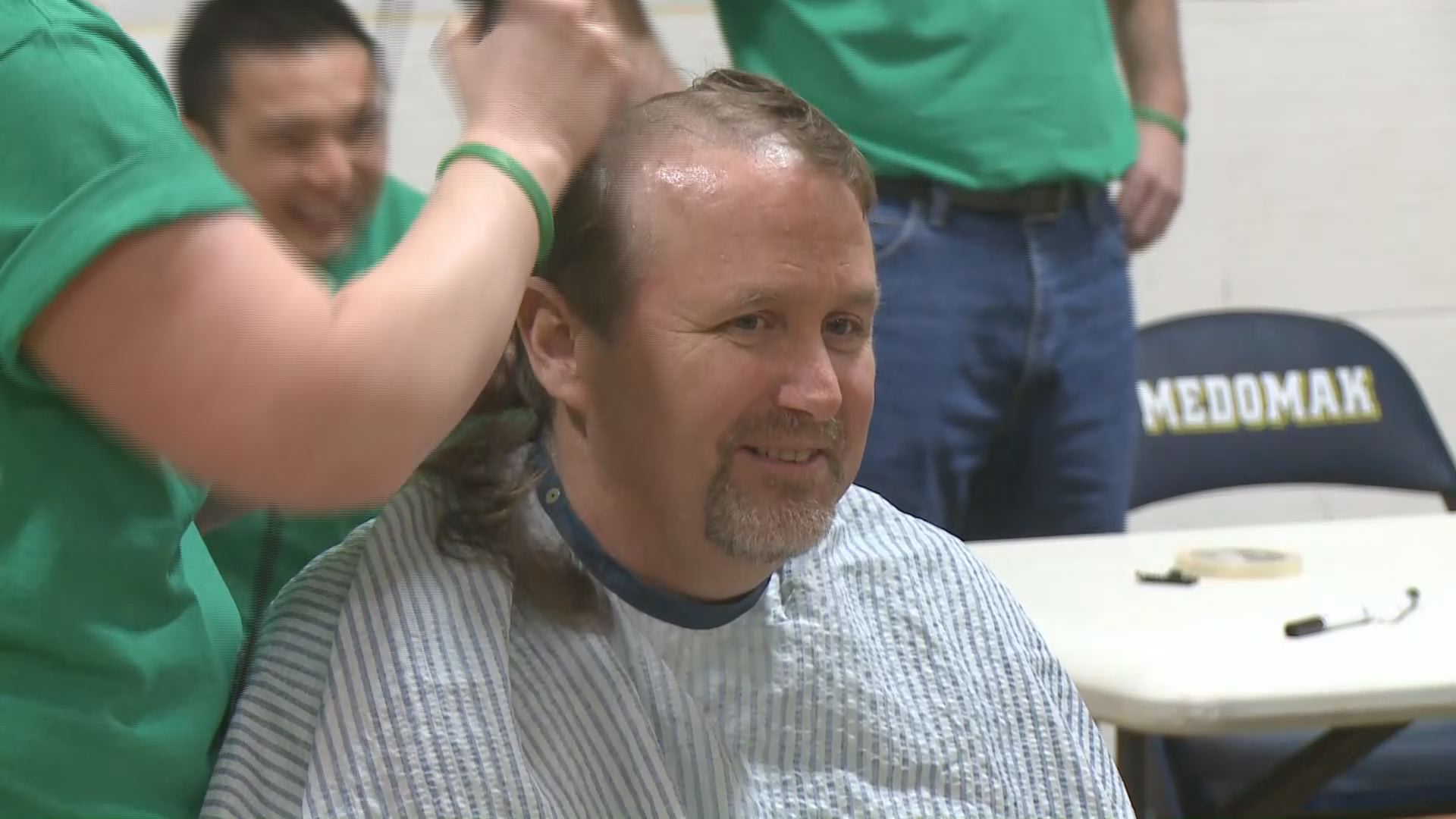 Teachers & staff shave heads to support principal with cancer ...